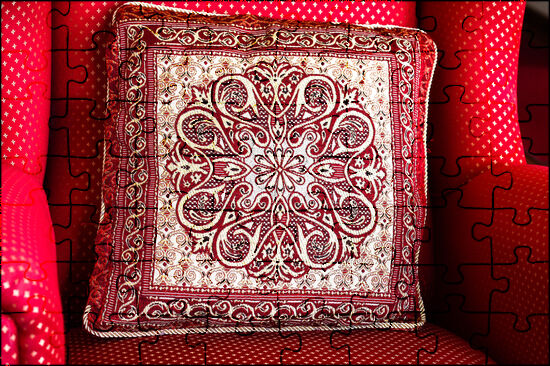Red Pattern Pillow On Red Chair Jigsaw Puzzle Online